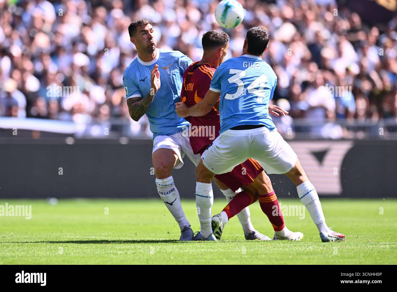 Alessio Romagnoli of S.S. Lazio, Evan Ferguson of A.S. Roma and Mario ...