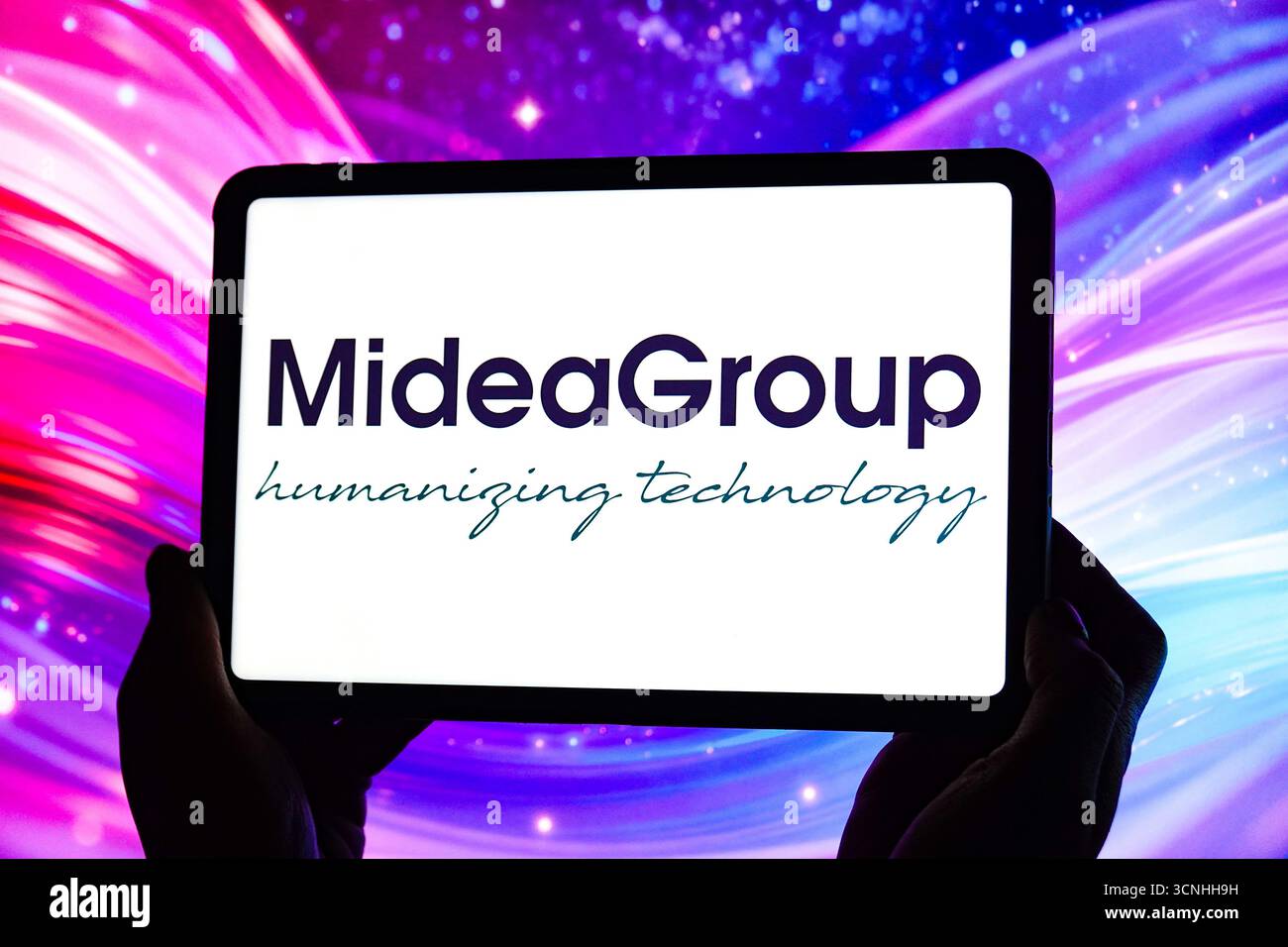 In this photo illustration, the Midea Group logo is displayed on the ...