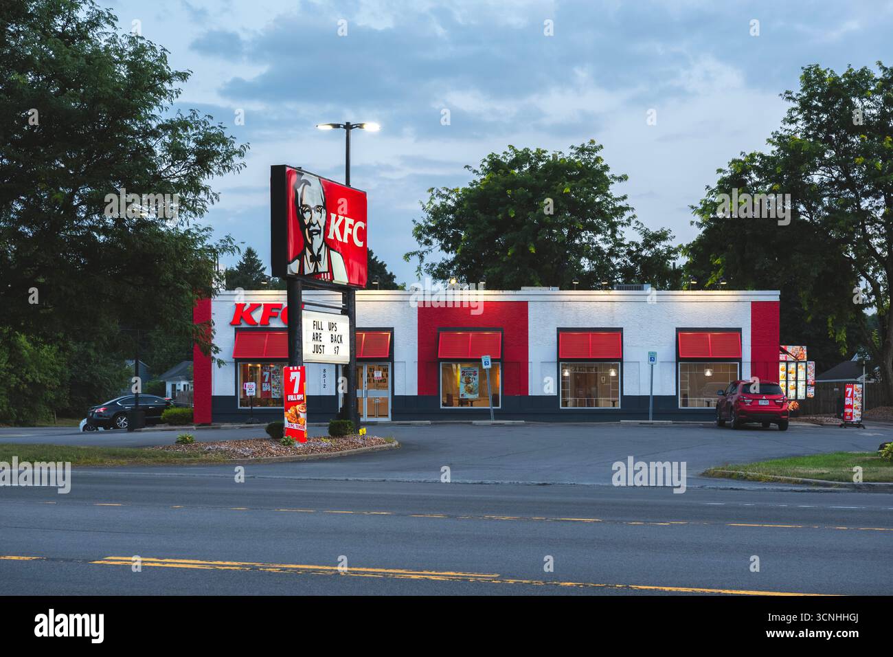 New Hartford, NY - Aug 6, 2025: Wide night view of KFC (Kentucky Fried ...
