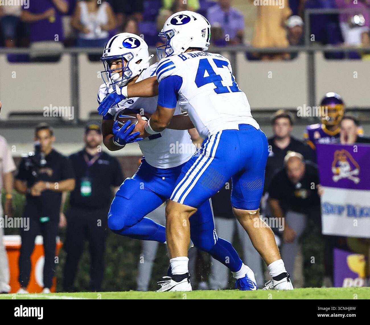 September 20, 2025: BYU running back LJ Martin (4) takes hand off from ...
