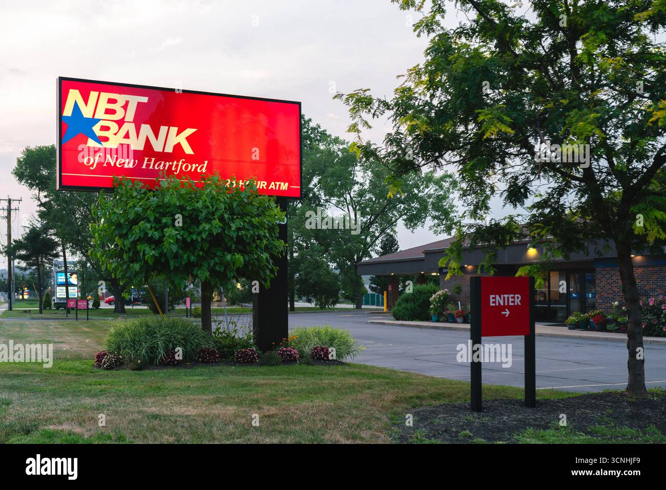 New Hartford, NY - Aug 6, 2025: Wide view of NBT Bank, is a community ...