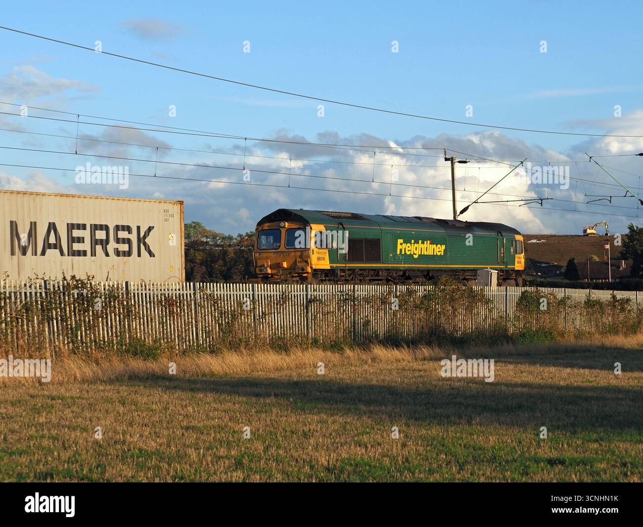 Freightliner Class 66 66516 hauls a container train through ...