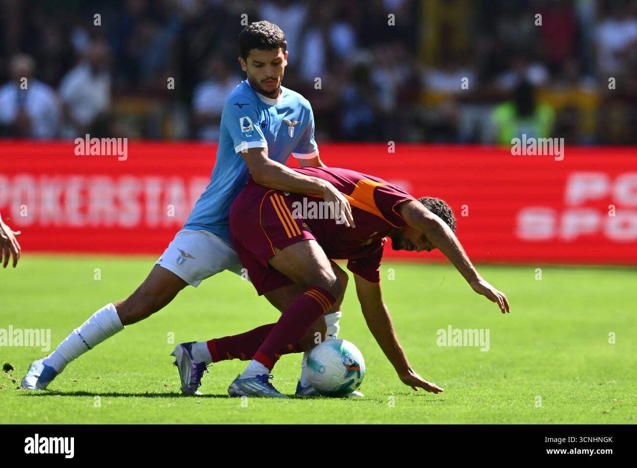 Reda Belahyane of S.S. Lazio and Devyne Rensch of A.S. Roma are in ...