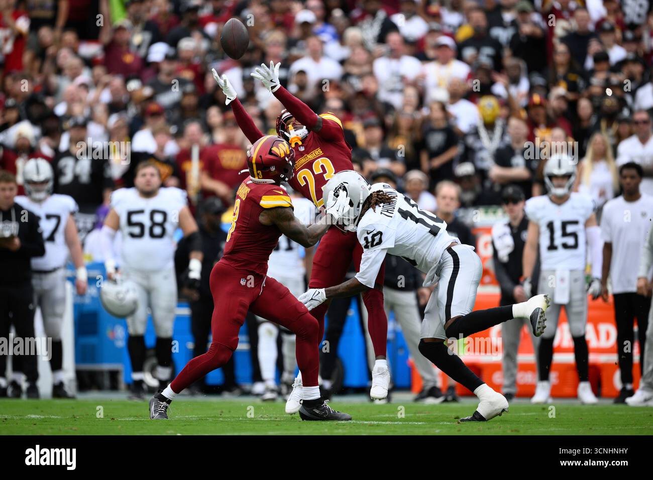 Washington Commanders cornerback Trey Amos (23) tries to get the ball ...