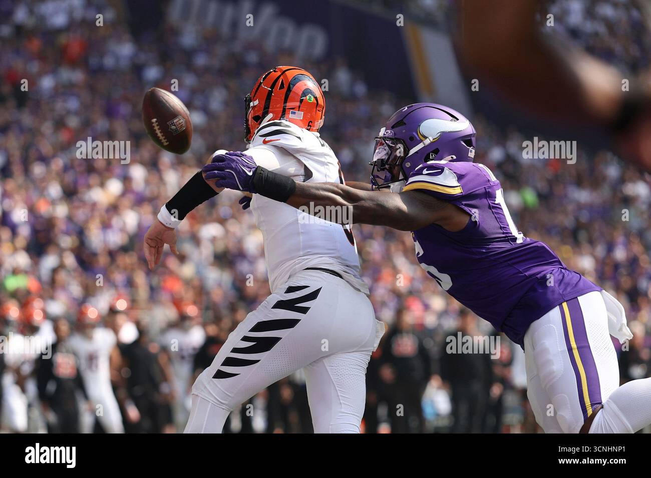 Cincinnati Bengals quarterback Jake Browning tosses the football while ...
