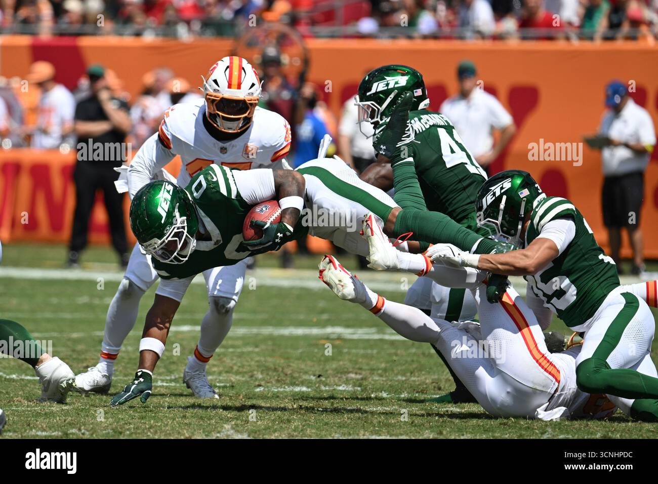 New York Jets running back Braelon Allen (0) catches a kickoff return ...