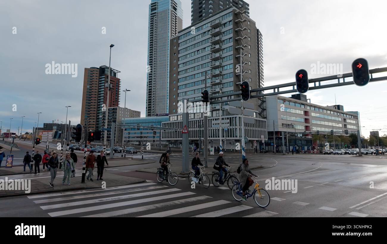 ROTTERDAM, NETHERLANDS - SEPTEMBER 13, 2025 - People cycling and ...