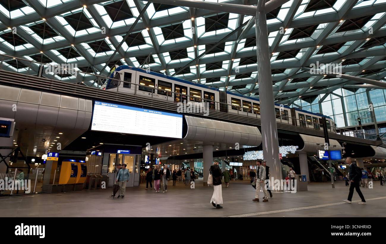 THE HAGUE, NETHERLANDS - SEPTEMBER 14, 2025 - Passengers walking inside ...