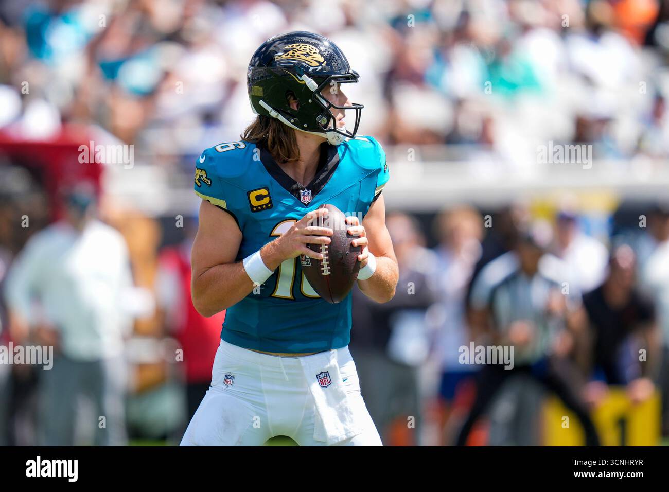 Jacksonville Jaguars quarterback Trevor Lawrence looks to pass against ...