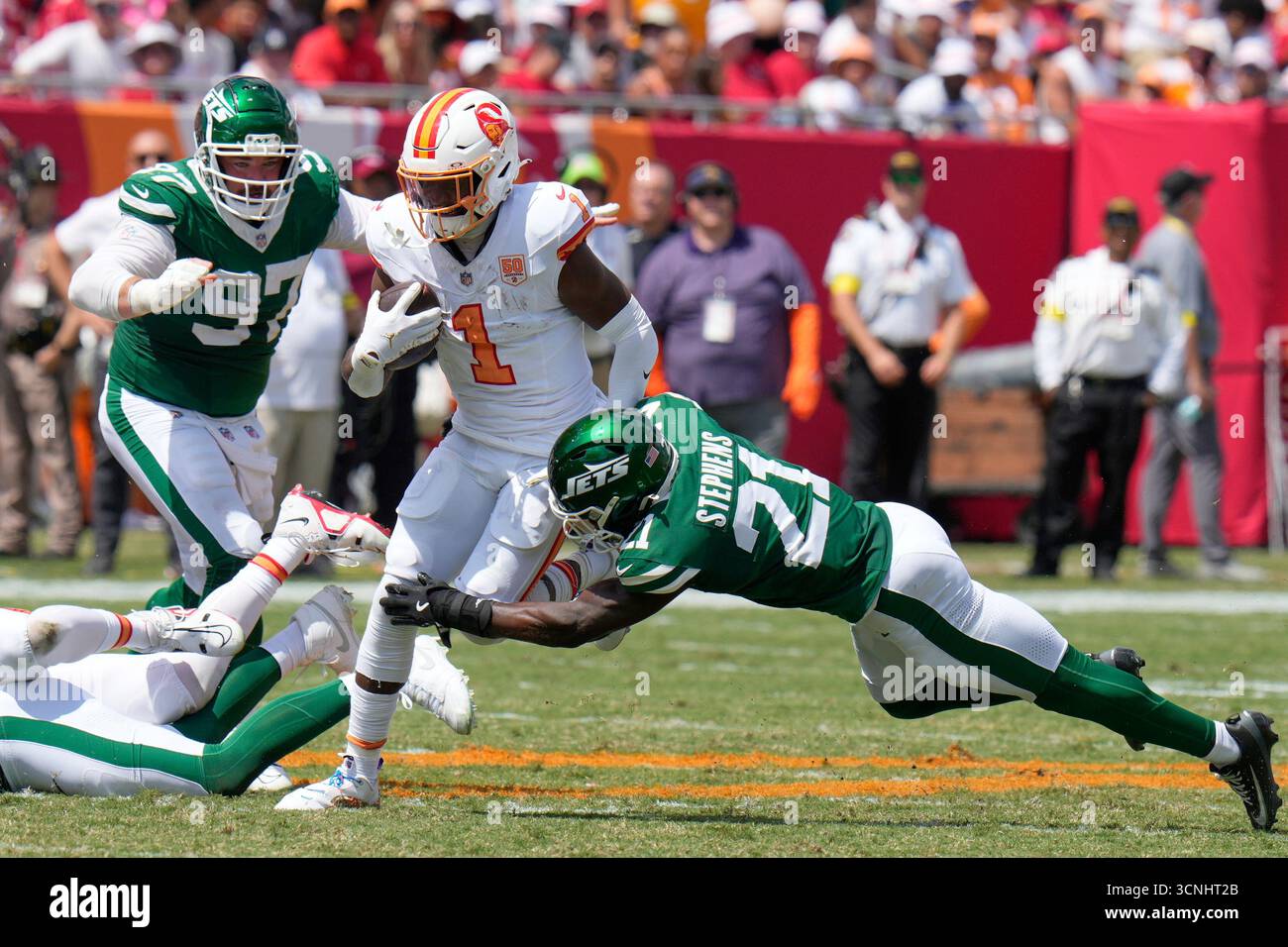 New York Jets cornerback Brandon Stephens (21) tackles Tampa Bay ...