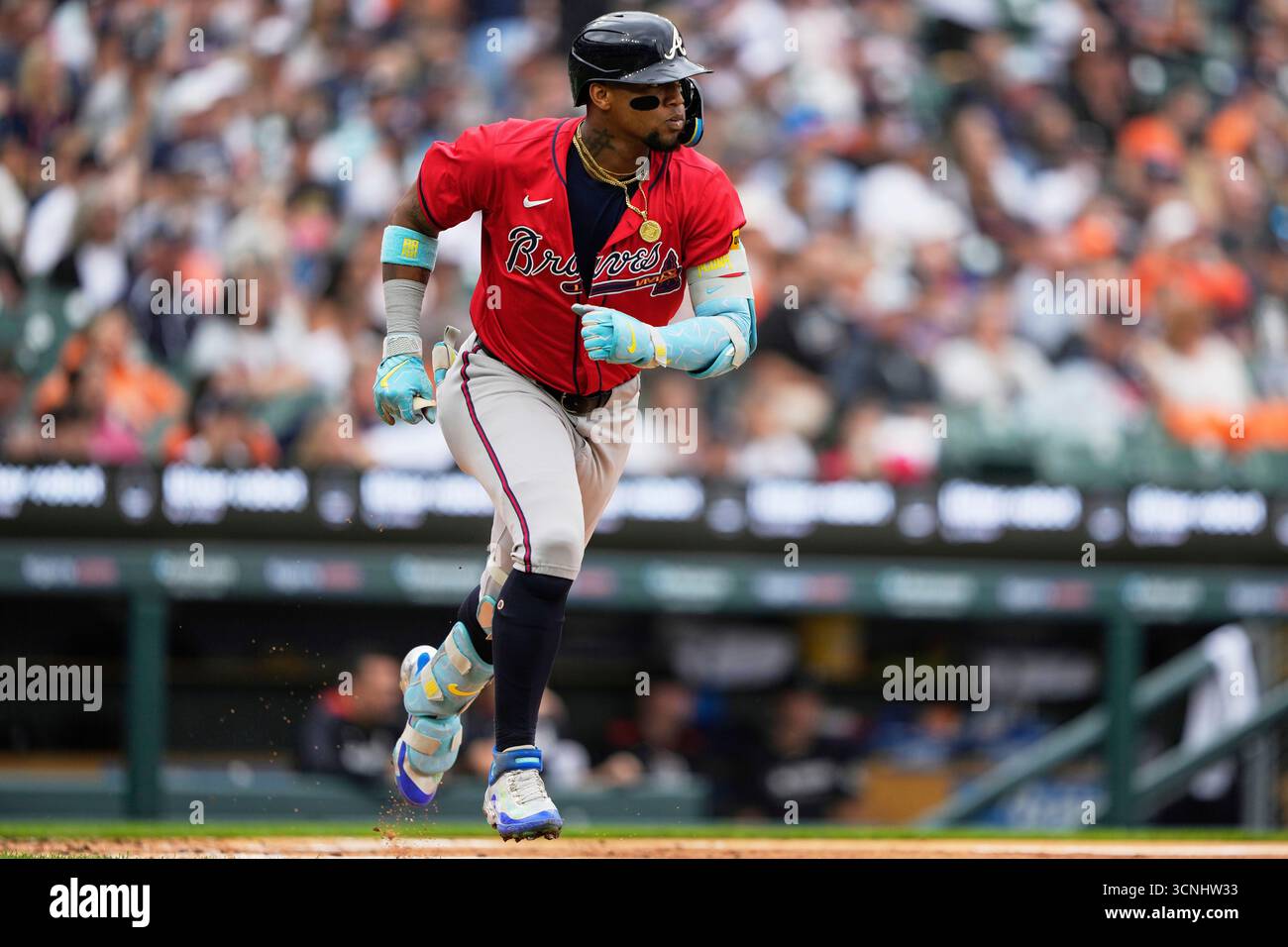 Atlanta Braves' Ronald Acuna Jr. runs after hitting a single that ...