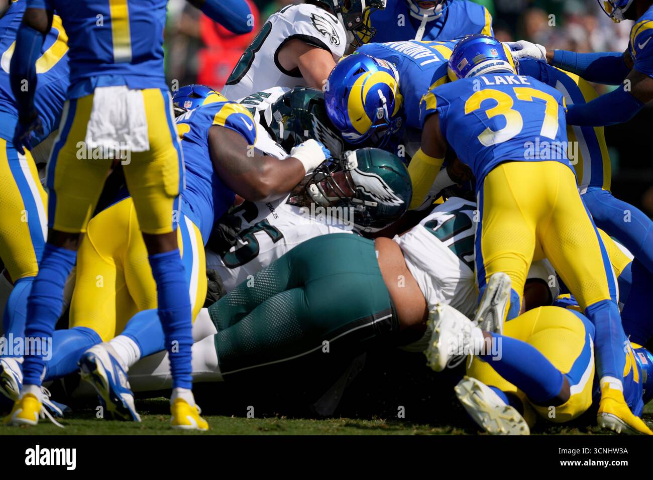 Philadelphia Eagles tackle Lane Johnson (65) ends up in a pile on a ...