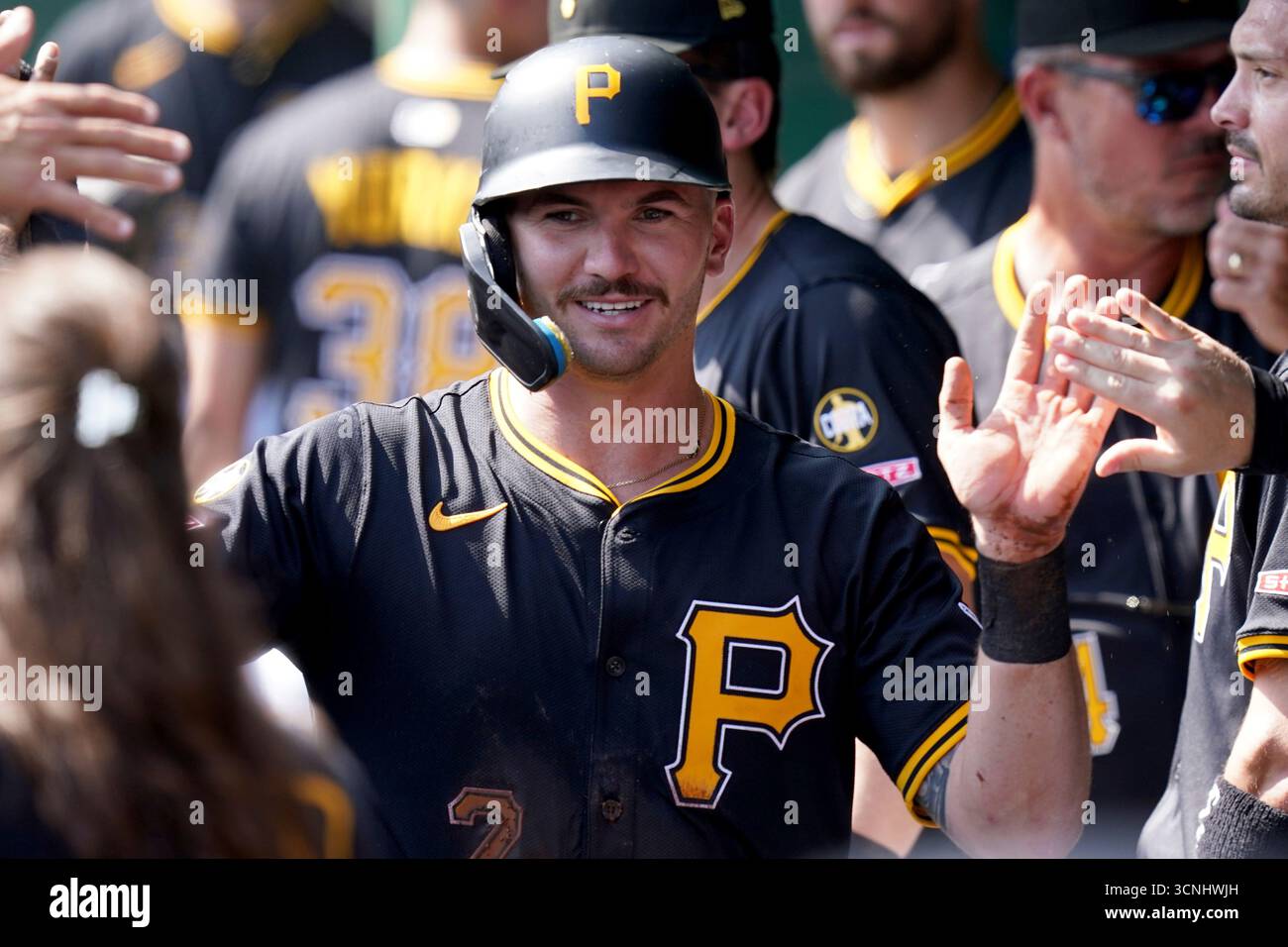 Pittsburgh Pirates' Spencer Horwitz celebrates in the dugout after ...