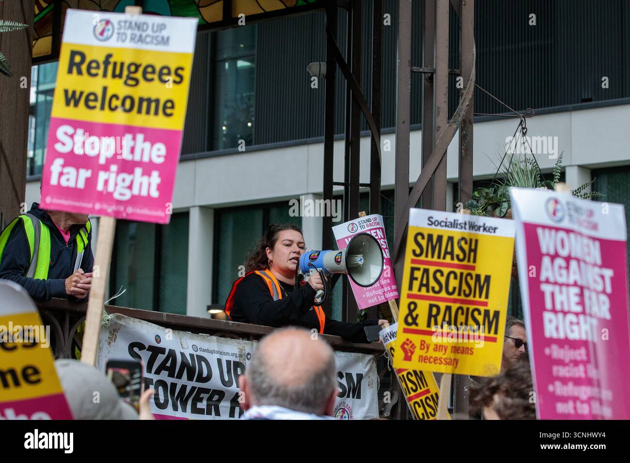 London, UK. 20th September, 2025. A speaker addresses supporters of ...