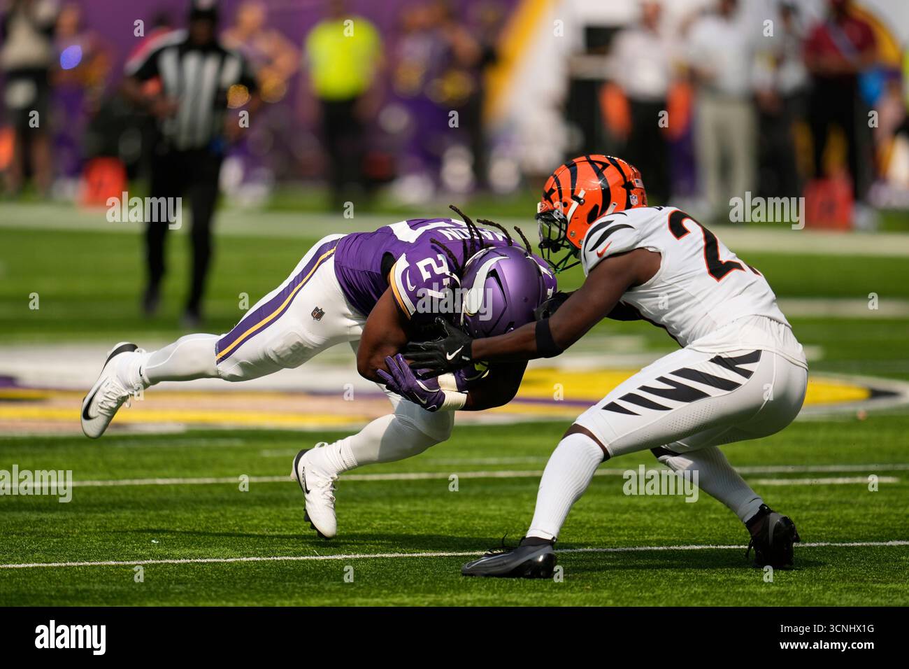 Minnesota Vikings running back Jordan Mason (27) is tackled by ...