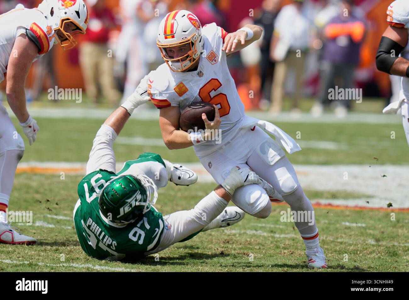 New York Jets defensive tackle Harrison Phillips (97) grabs Tampa Bay ...