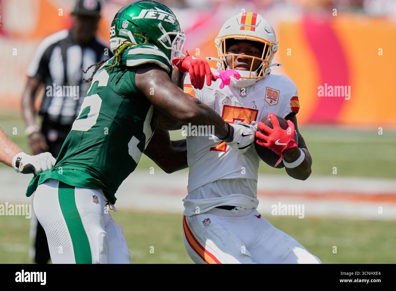 New York Jets linebacker Quincy Williams (56) tackles Tampa Bay ...