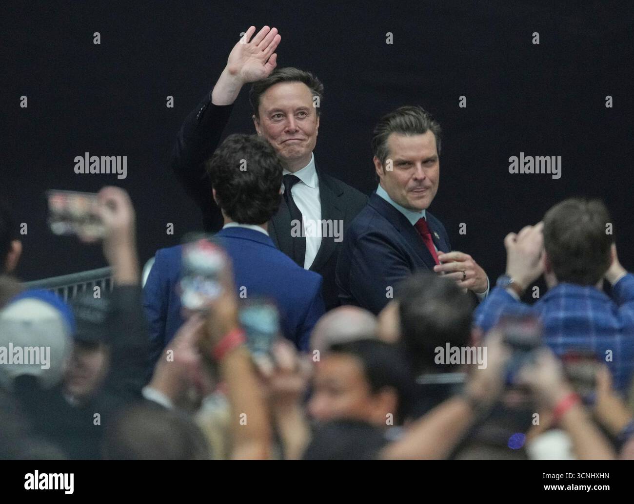 Elon Musk waves to supporters alongside former Rep. Matt Gaetz, R- Fla ...