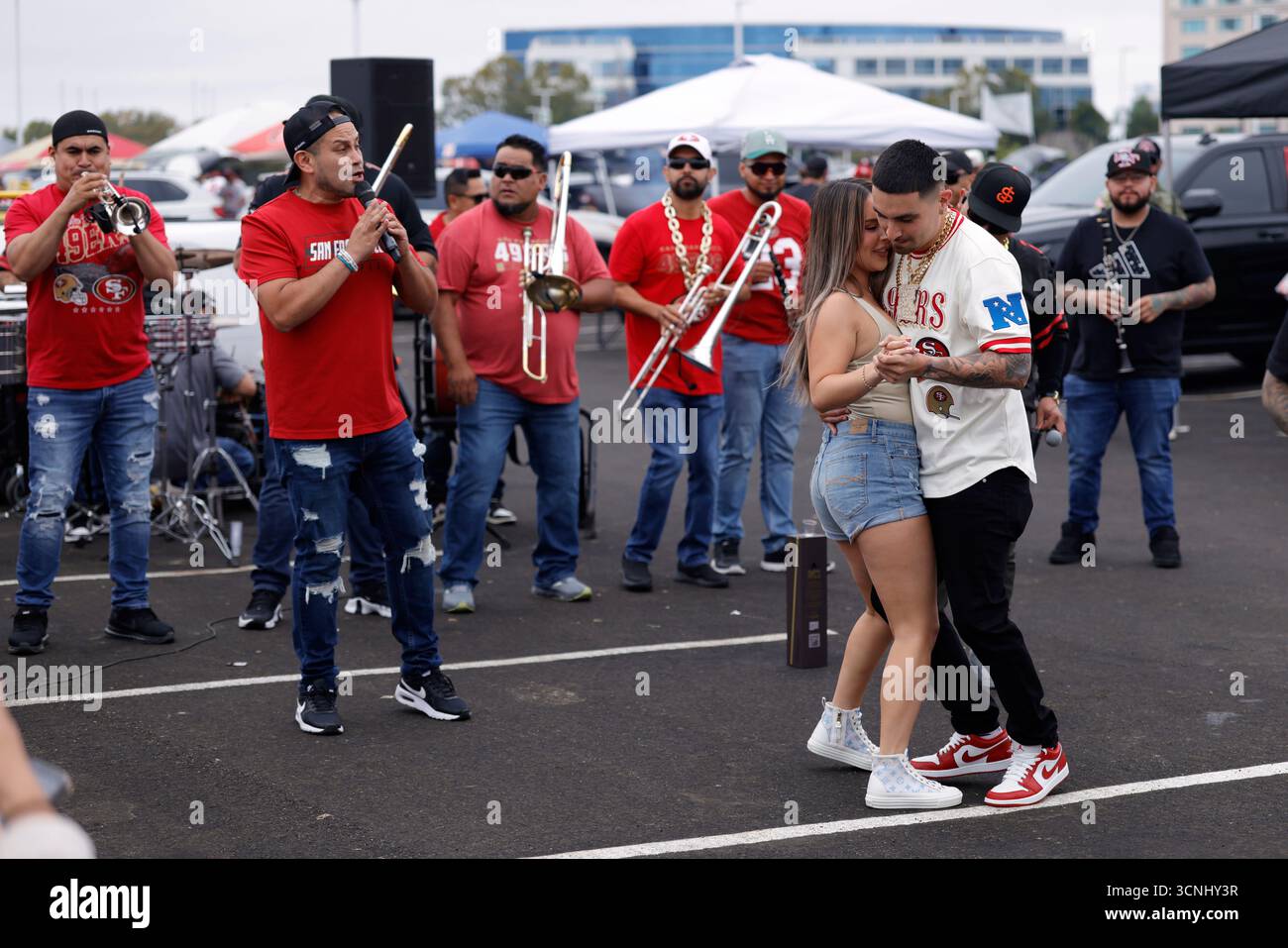 San Francisco 49ers fans dance in the parking lot prior to an NFL ...