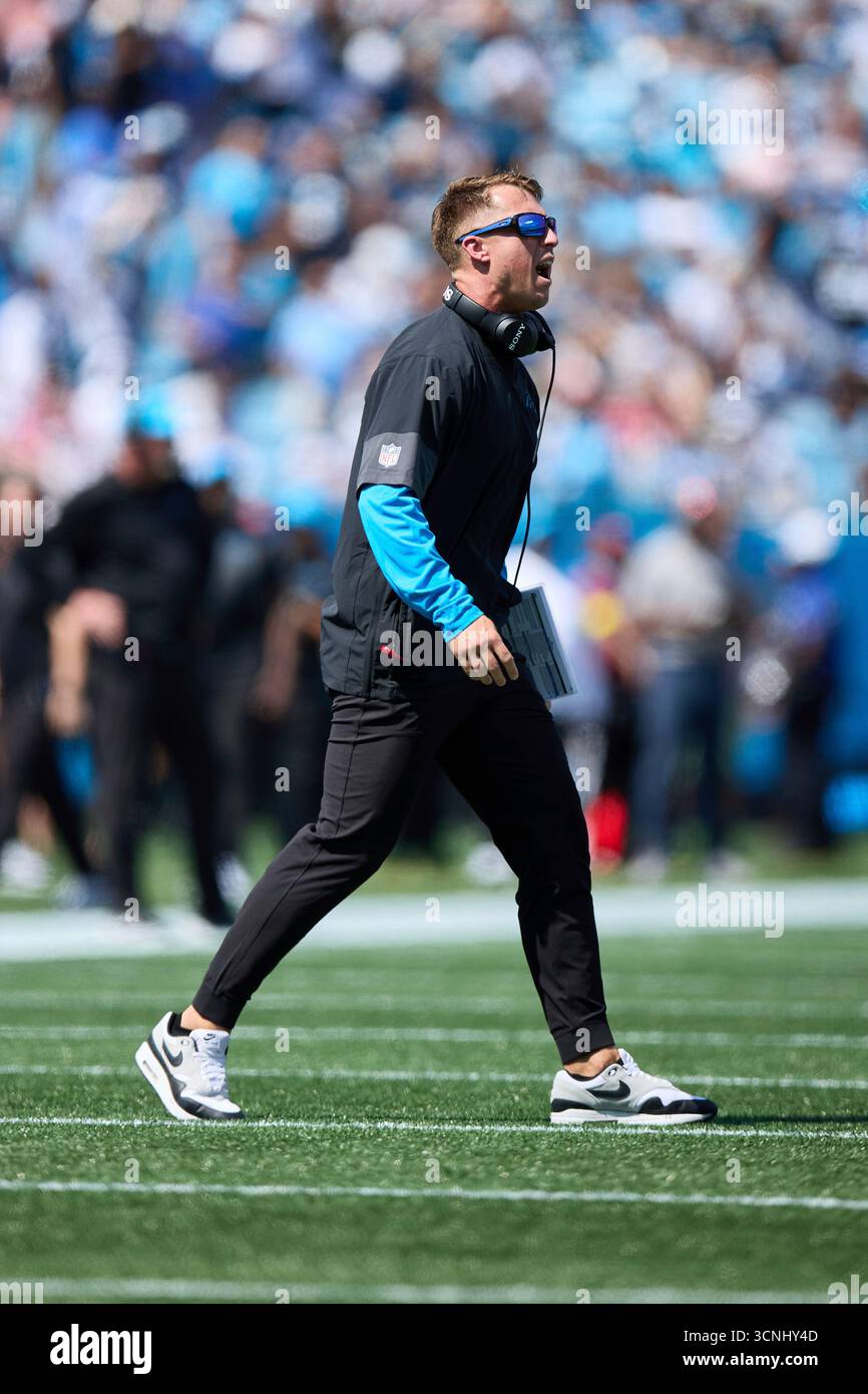 Carolina Panthers offensive coordinator Brad Idzik runs on the field to celebrate a touchdown ...