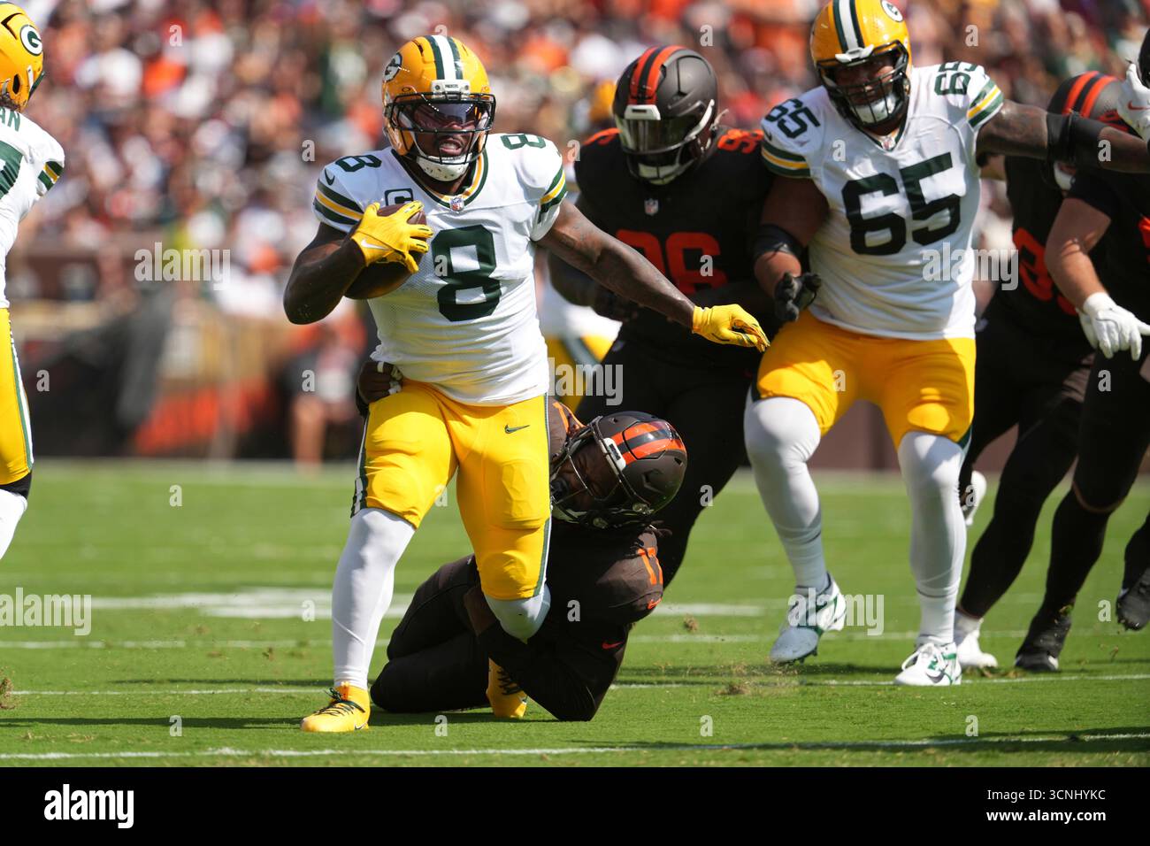 Green Bay Packers running back Josh Jacobs (8) carries the ball as ...