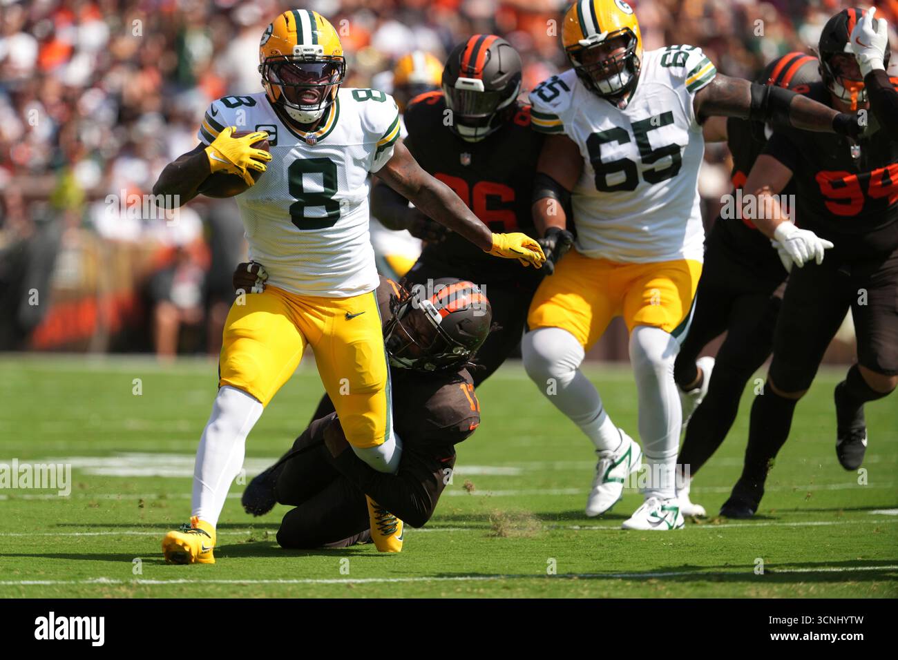Green Bay Packers running back Josh Jacobs (8) carries the ball as ...