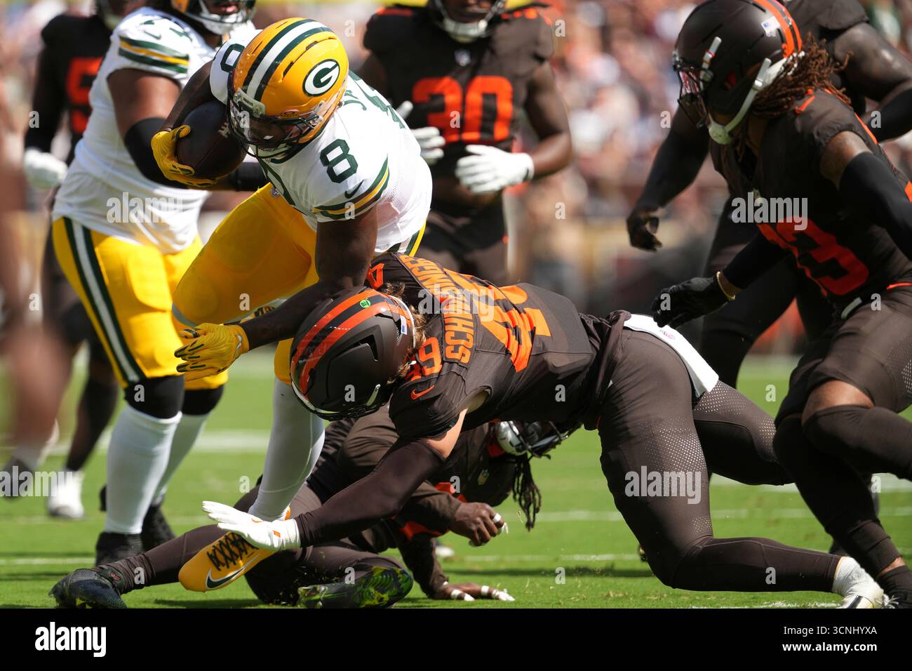 Green Bay Packers running back Josh Jacobs (8) carries the ball as ...