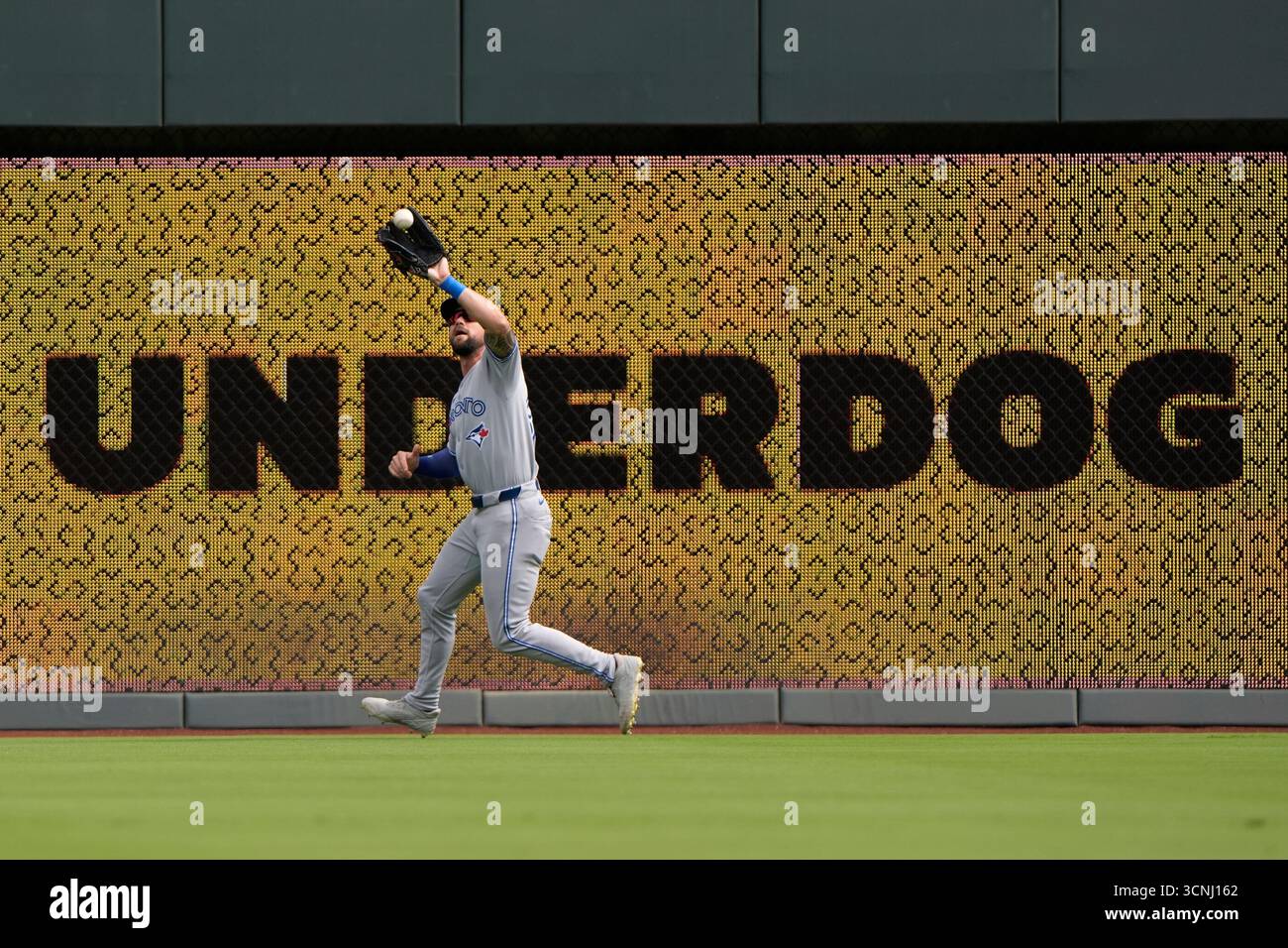 Toronto Blue Jays Nathan Lukes catches a fly ball for the out on Kansas ...
