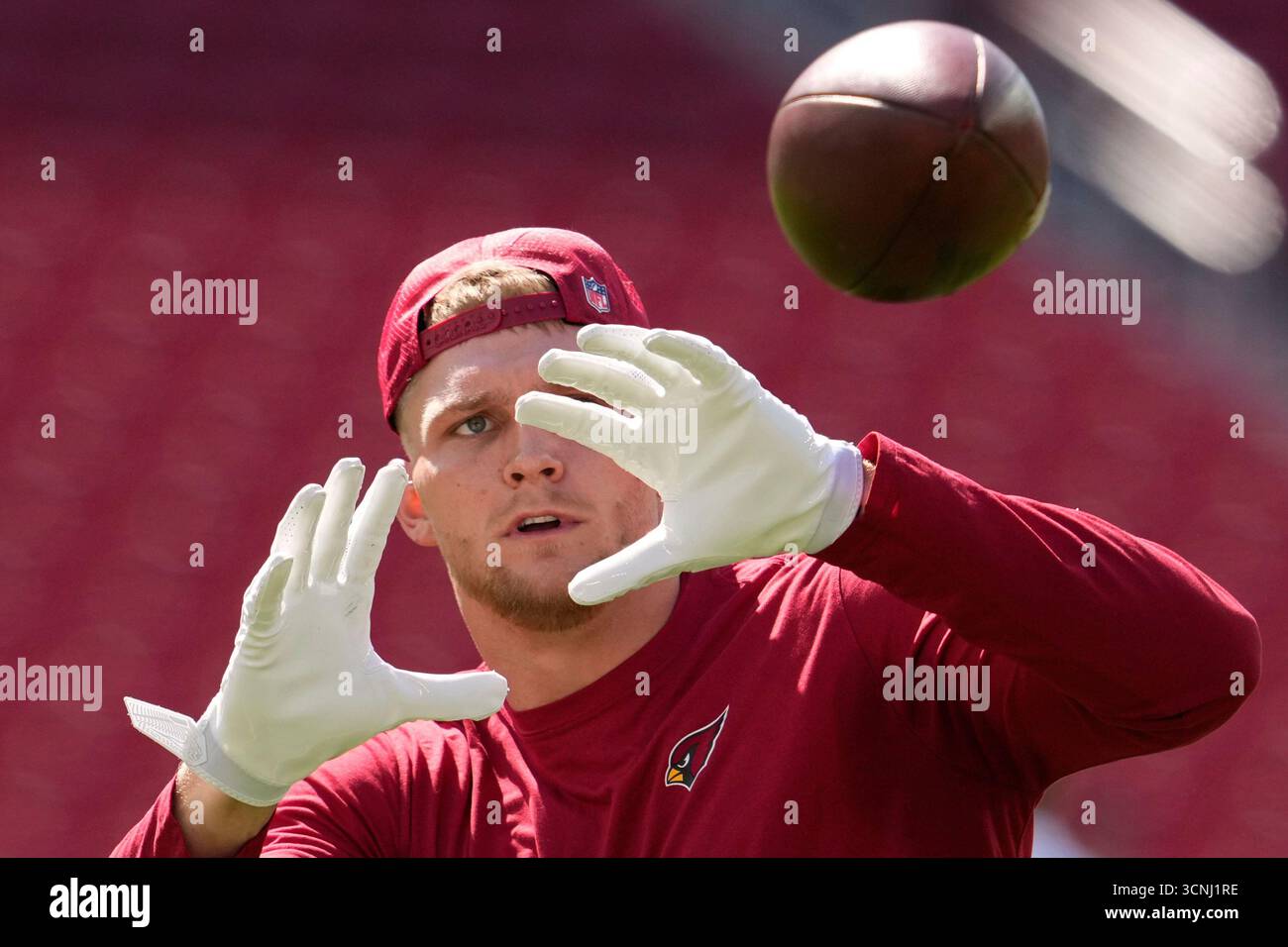 Arizona Cardinals tight end Trey McBride warms up prior to an NFL ...