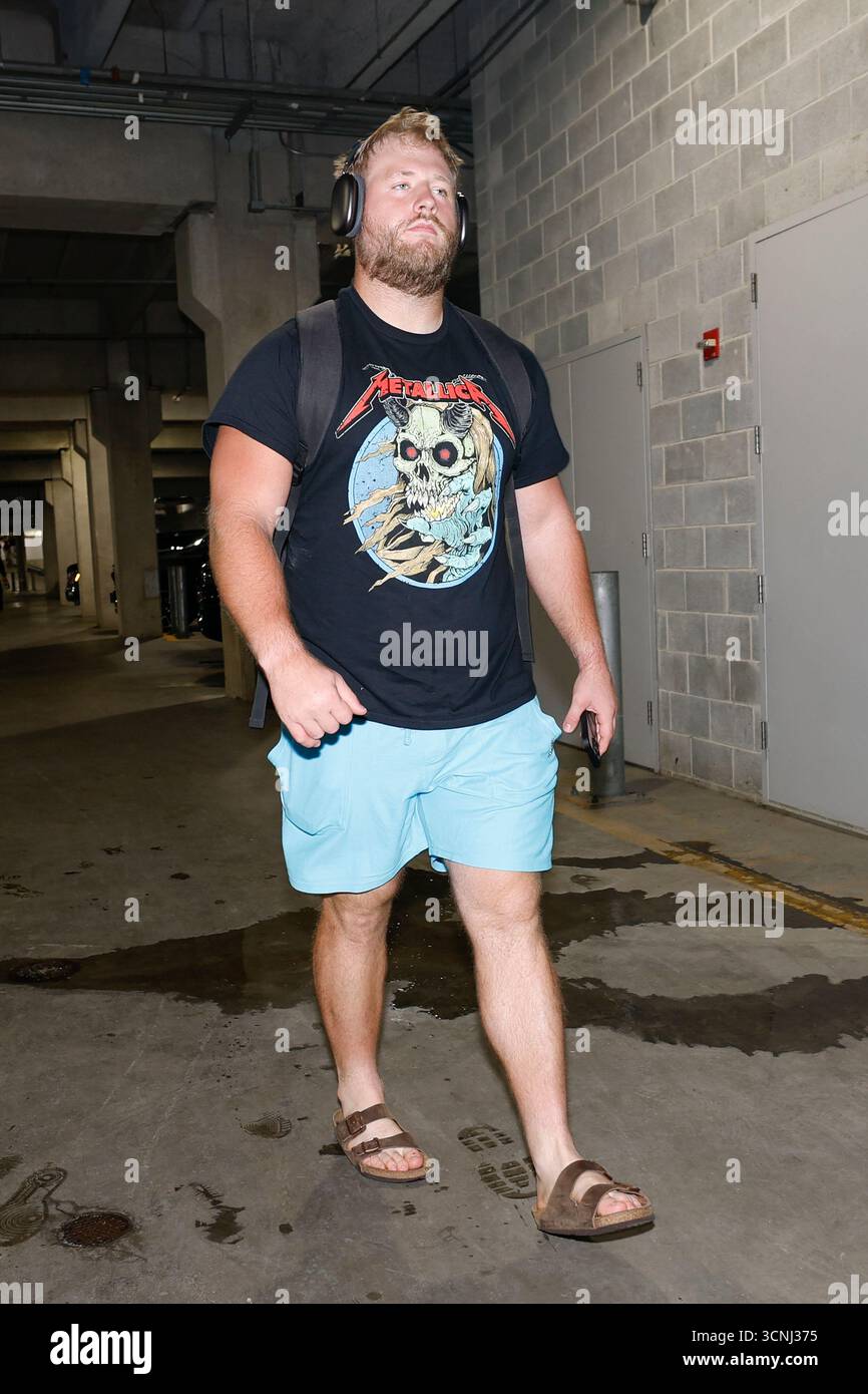 Chicago Bears guard Luke Newman (65) arrives at Soldier Field before an ...