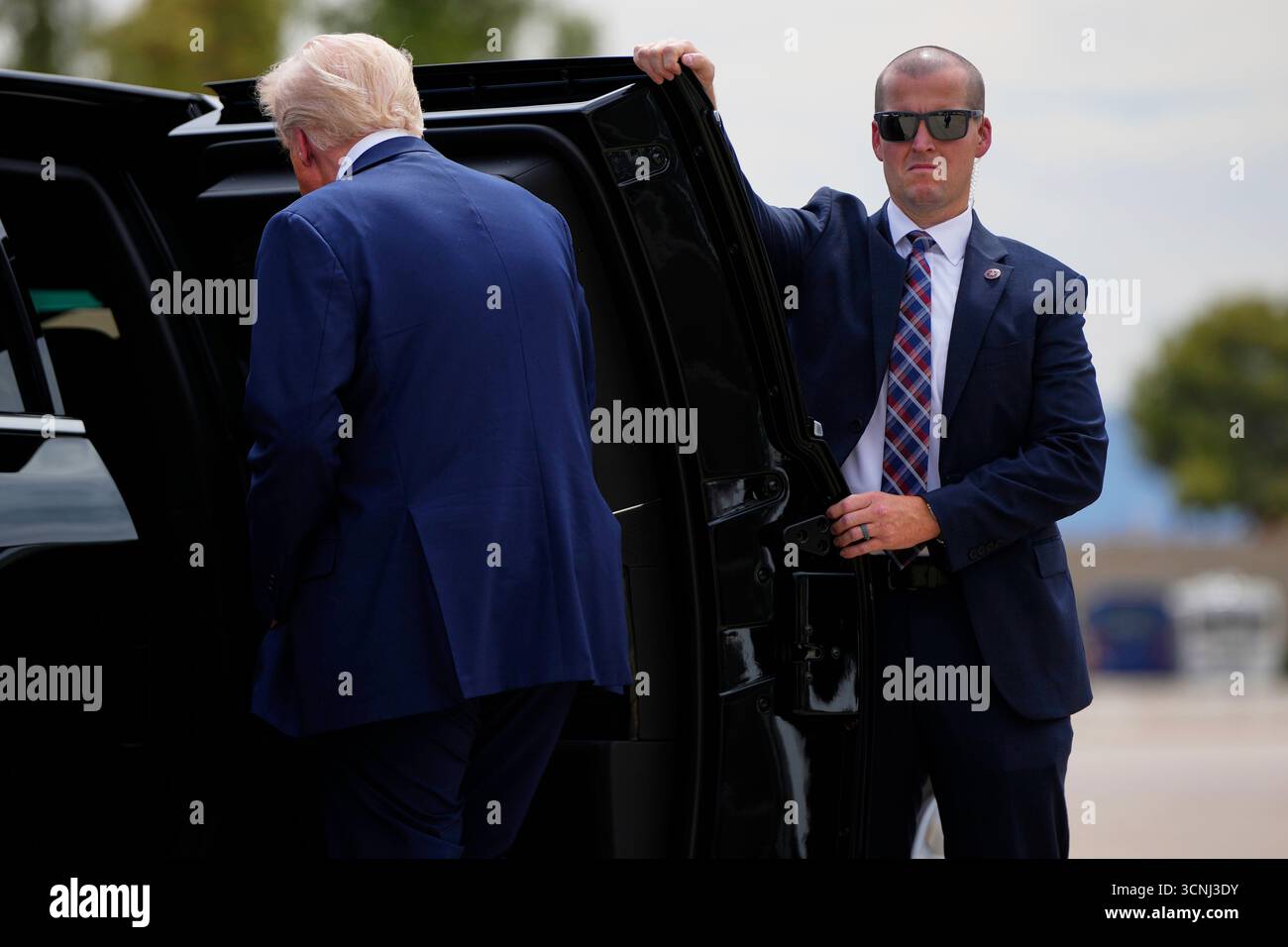 President Donald Trump boards his vehicle, Sunday, Sept. 21, 2025, at ...