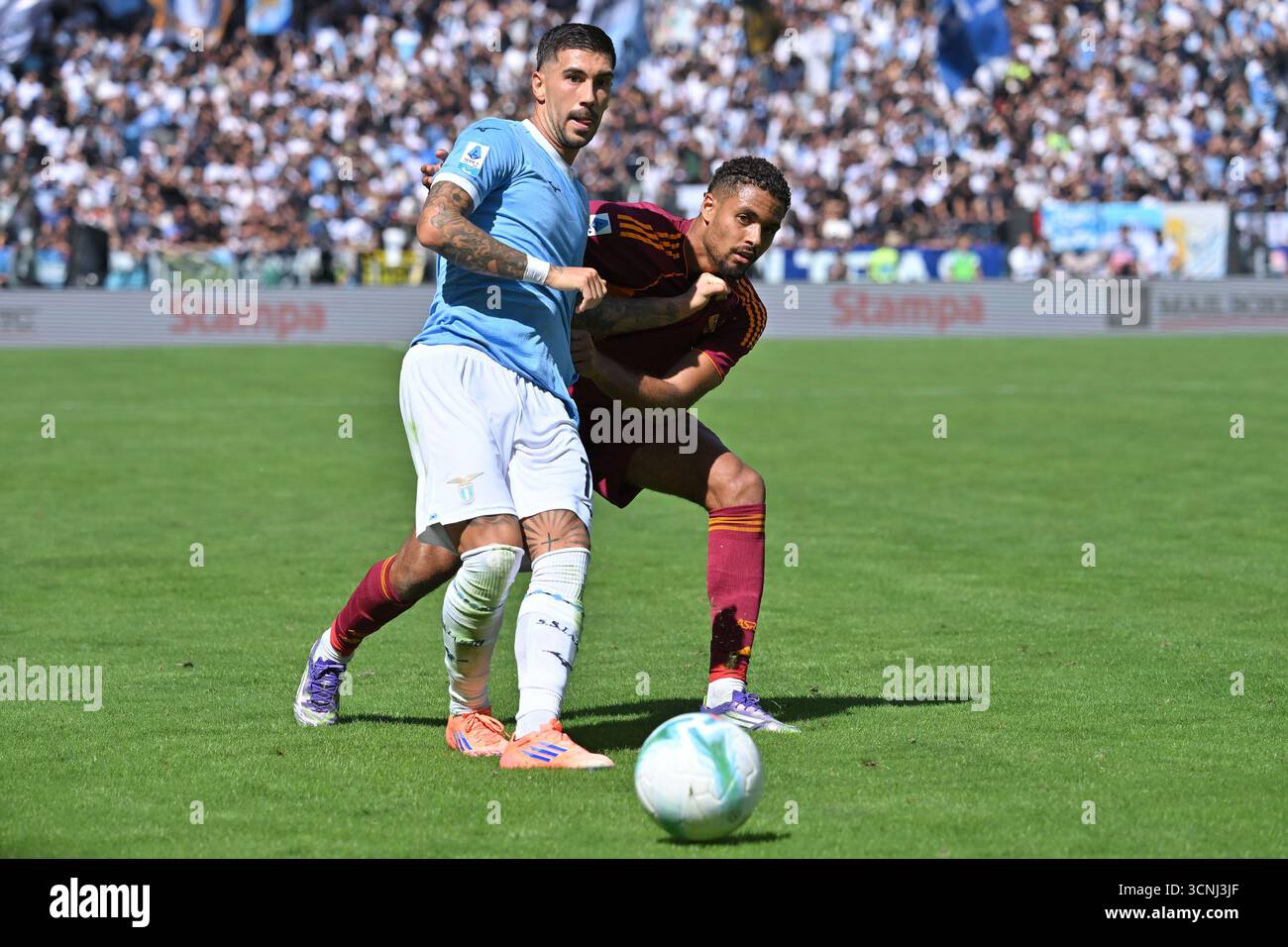 Mattia Zaccagni of SS Lazio,Devyne Rensch of AS Roma during the serie A ...
