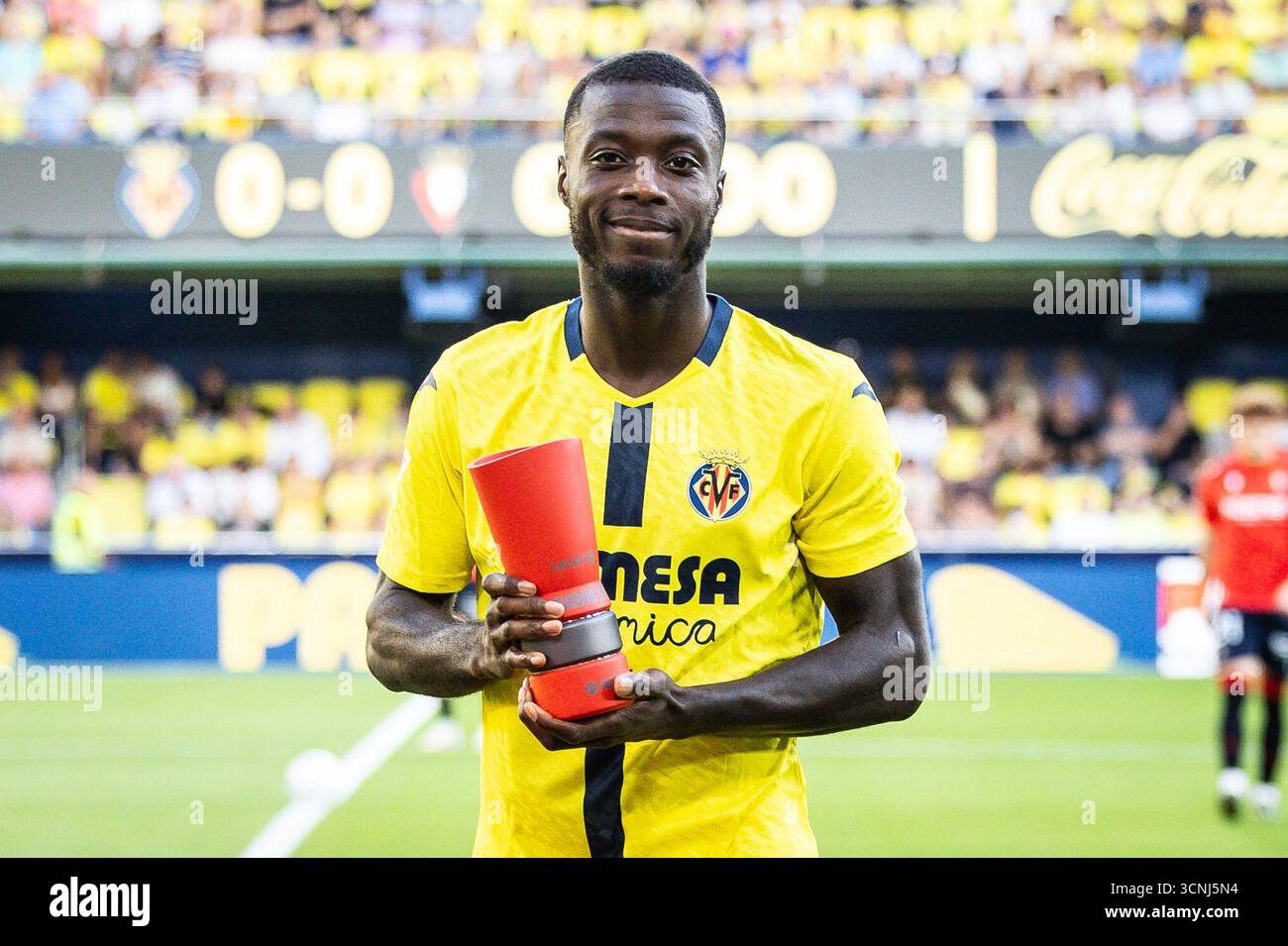 Nicolas PEPE of Villarreal CF holds up the LaLiga Player Of The Month ...