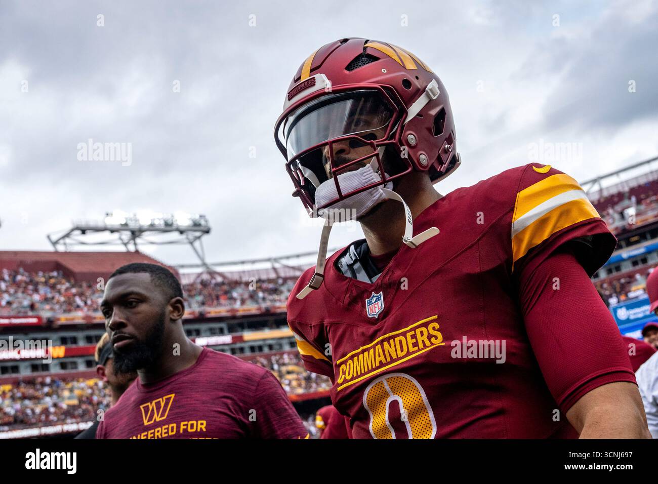 Washington Commanders quarterback Marcus Mariota (8) returns to the ...