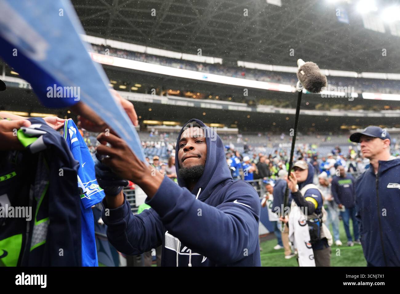 Seattle Seahawks cornerback Devon Witherspoon signs autographs before ...