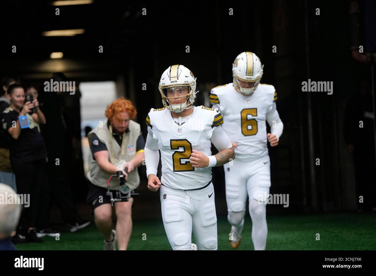 New Orleans Saints quarterback Spencer Rattler (2) runs onto the field ...
