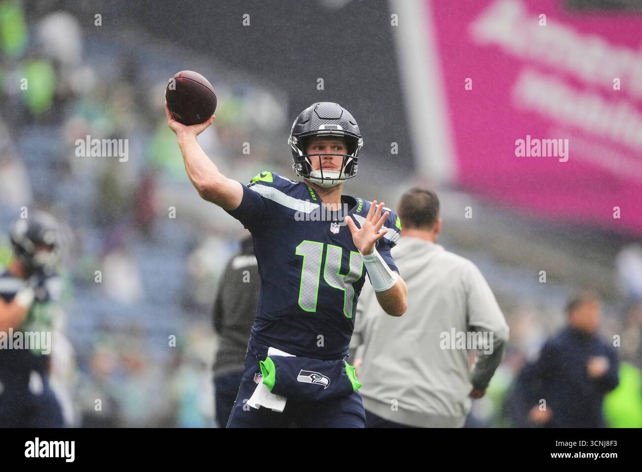 Seattle Seahawks quarterback Sam Darnold (14) warms up before an NFL ...