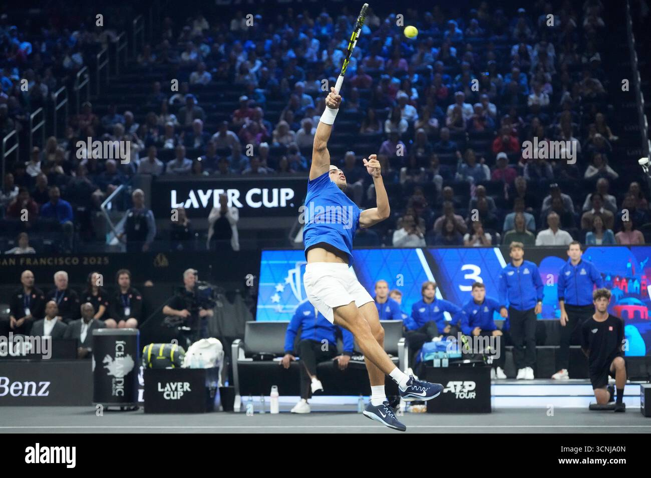 Team Europe's Carlos Alcaraz, of Spain, returns a shot during a doubles ...