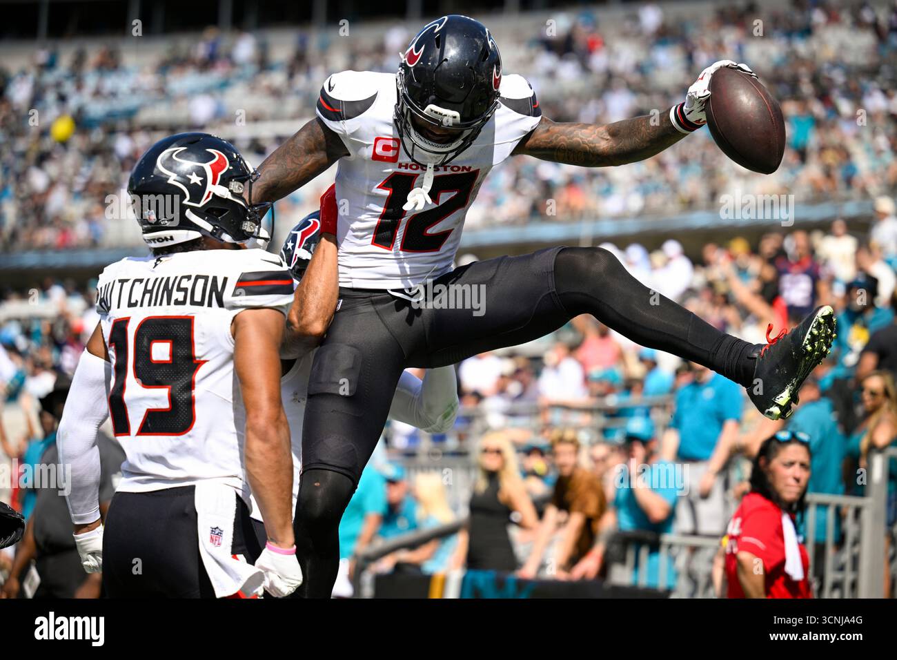 Houston Texans wide receiver Nico Collins (12) celebrates a touchdown ...
