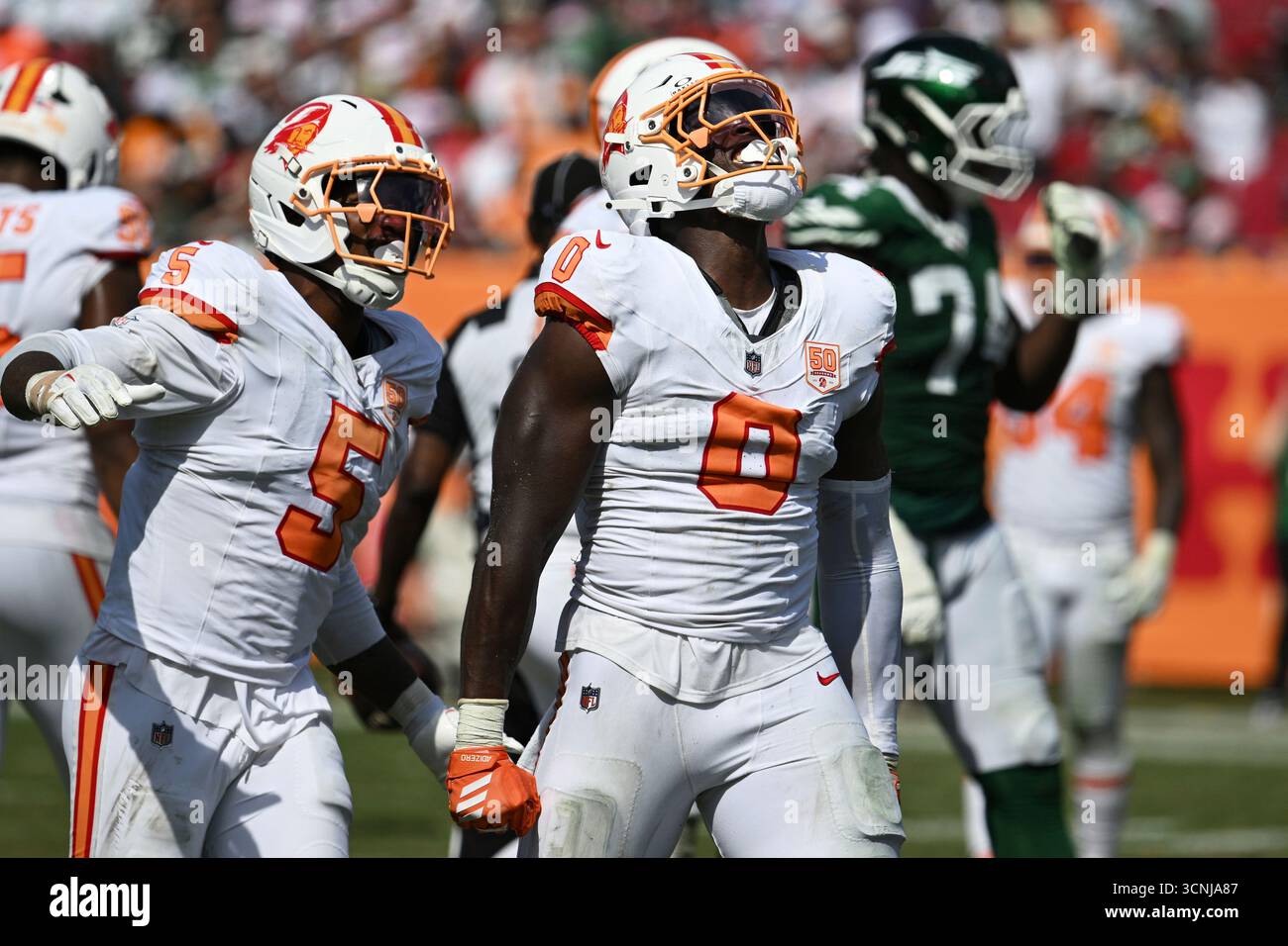 Tampa Bay Buccaneers offensive lineman Yaya Diaby (0) celebrates a sack ...