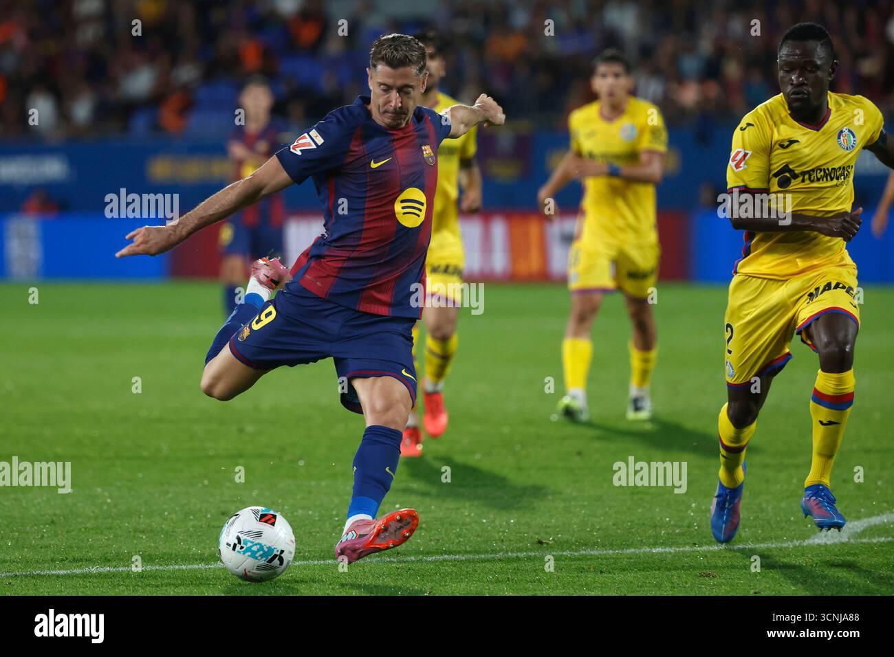 Barcelona's Robert Lewandowski kicks the ball during a Spanish La Liga ...