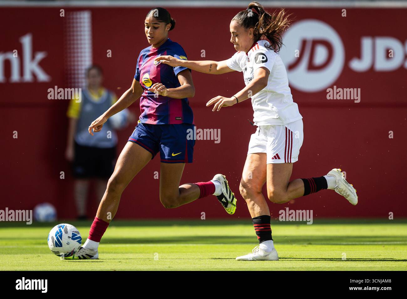 Sydney SCHERTENLEIB of Barcelona and Isabel ALVAREZ of Sevilla FC ...