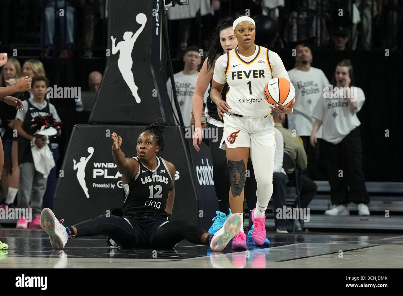 Las Vegas Aces guard Chelsea Gray (12) reacts after a foul by the ...