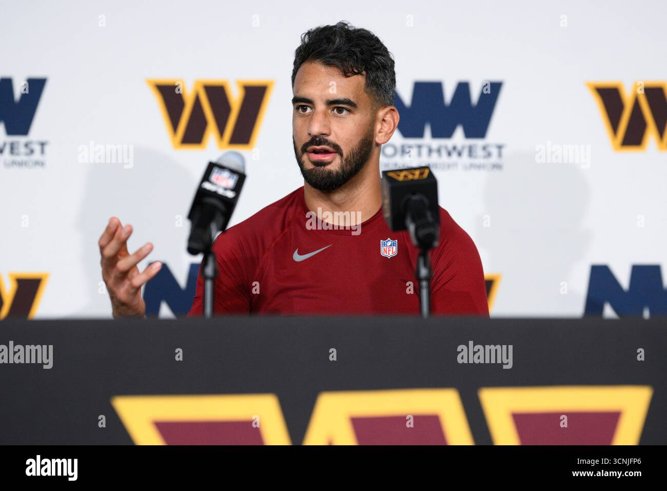 Washington Commanders quarterback Marcus Mariota speaks during a news ...