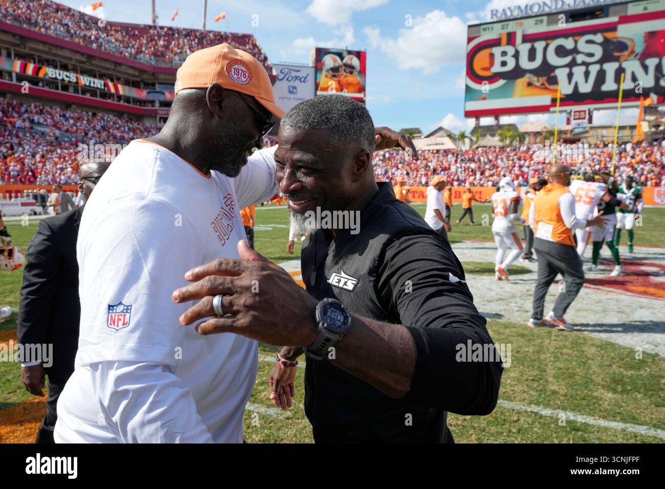 Tampa Bay Buccaneers head coach Todd Bowles, left, and New York Jets ...