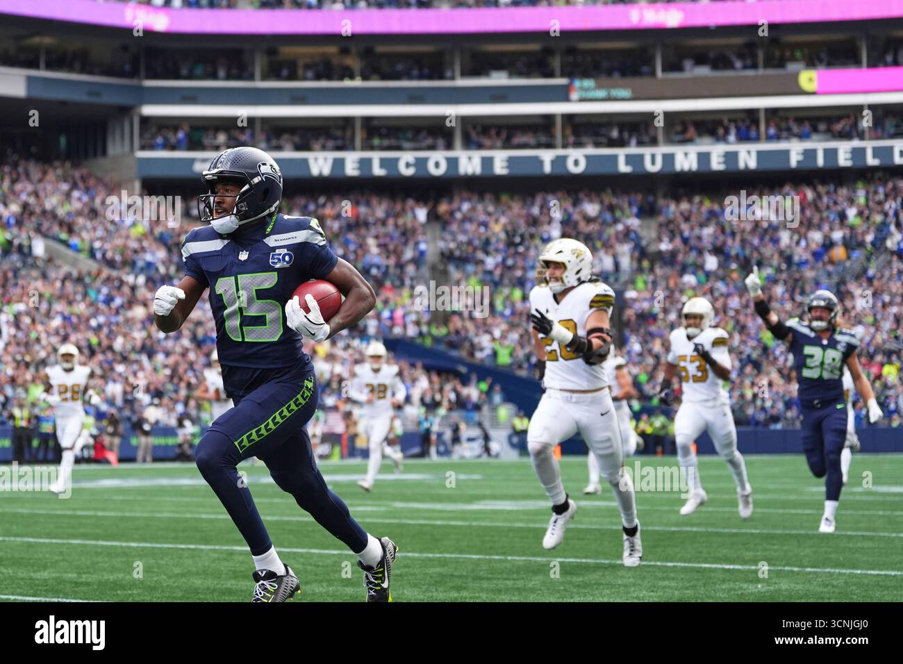 Seattle Seahawks wide receiver Tory Horton (15) returns a punt for a ...