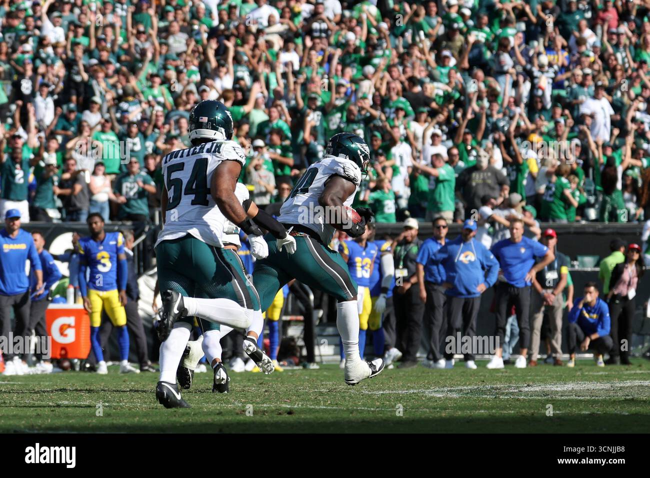 Philadelphia Eagles defensive tackle Jordan Davis (90) runs his blocked ...