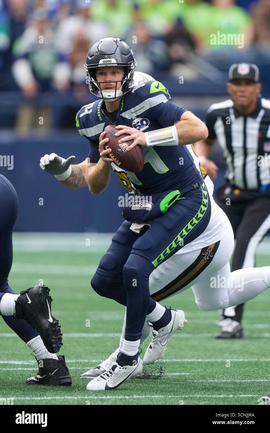 Seattle Seahawks quarterback Sam Darnold (14) scrambles during the ...