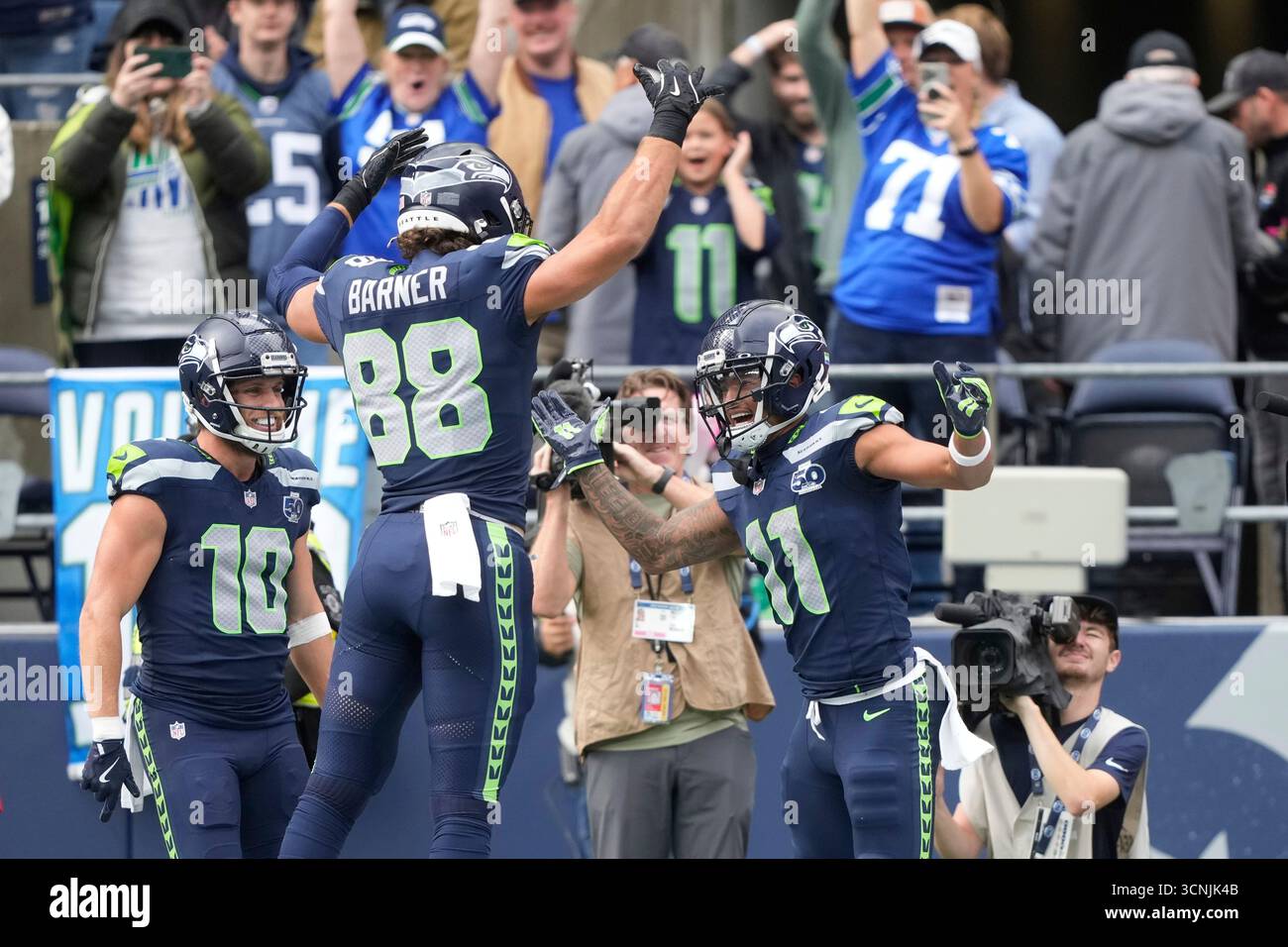Seattle Seahawks wide receiver Jaxon Smith-Njigba (11) celebrates a ...