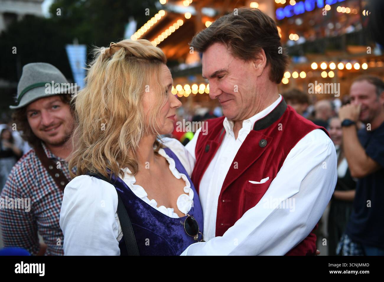 21 September 2025, Bavaria, Munich: Carsten Maschmeyer (r) and Veronica ...